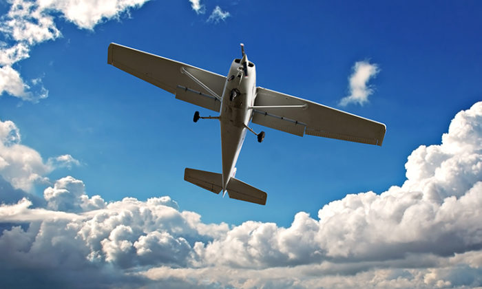 Aircraft inspecting transmission lines in CORE service area - CORE
